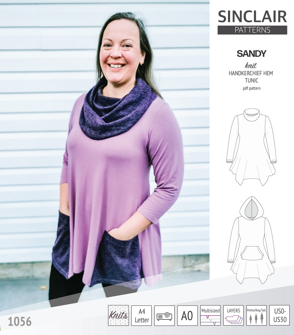 Sandy knit handkerchief hem tunic with a cowl, collar, hood and pockets ...
