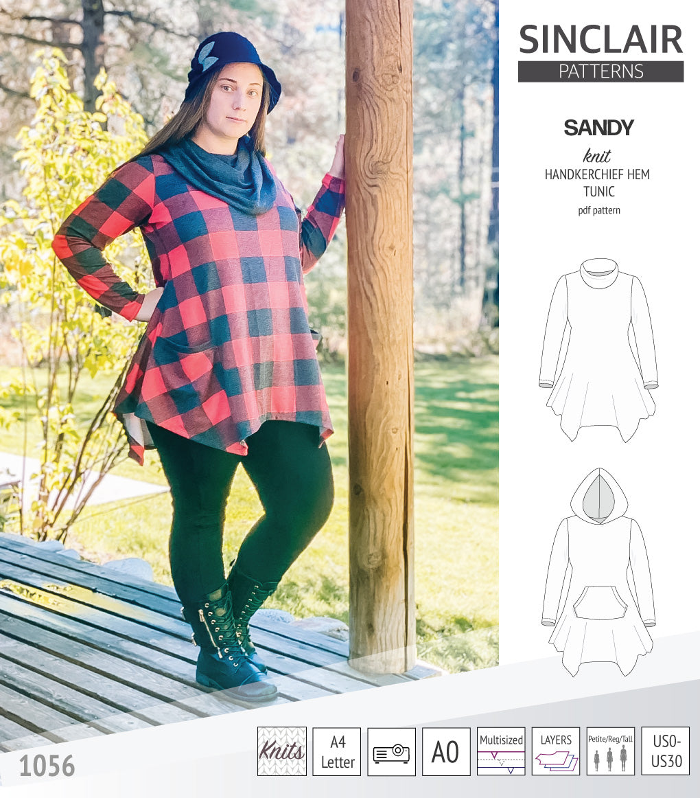 Sandy knit handkerchief hem tunic with a cowl, collar, hood and pockets ...