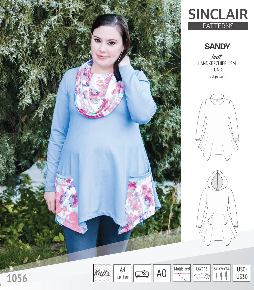 Sandy knit handkerchief hem tunic with a cowl, collar, hood and pockets ...
