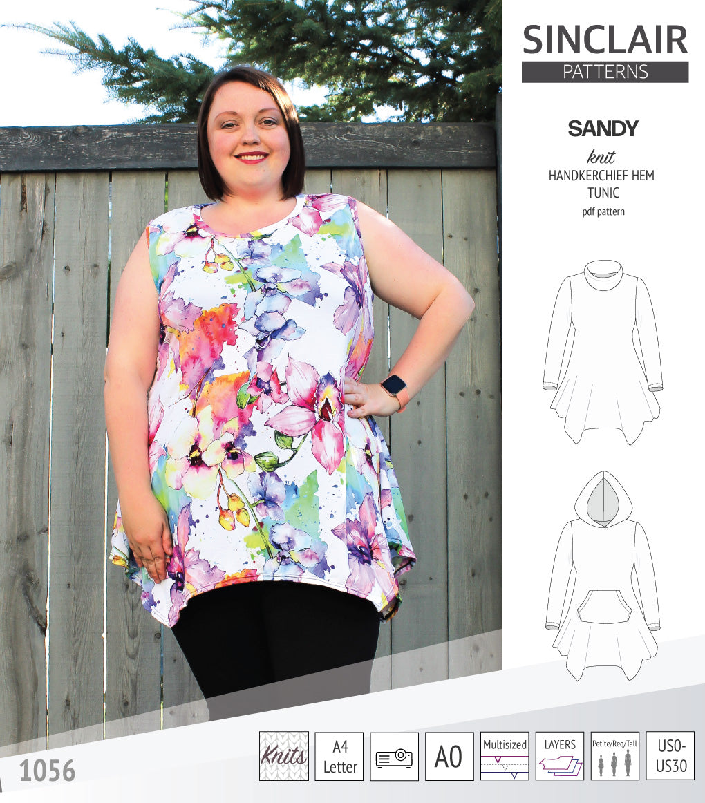 Sandy knit handkerchief hem tunic with a cowl, collar, hood and pockets ...