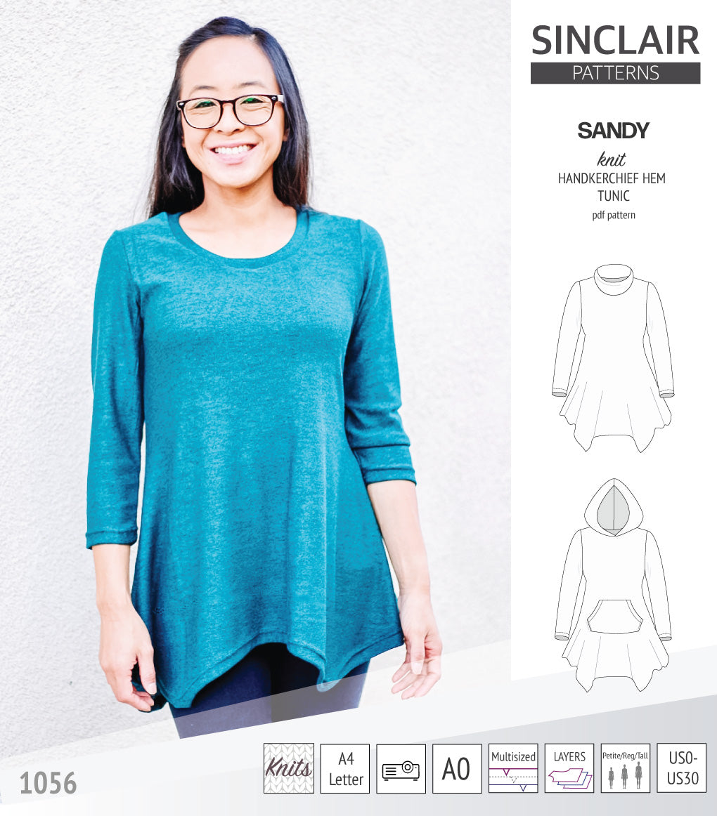 Sandy knit handkerchief hem tunic with a cowl, collar, hood and pockets ...